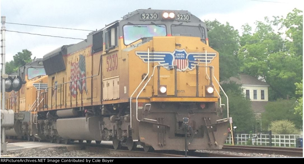 UP 5230 (EMD SD70M) leads manifest train with an all EMD lash up